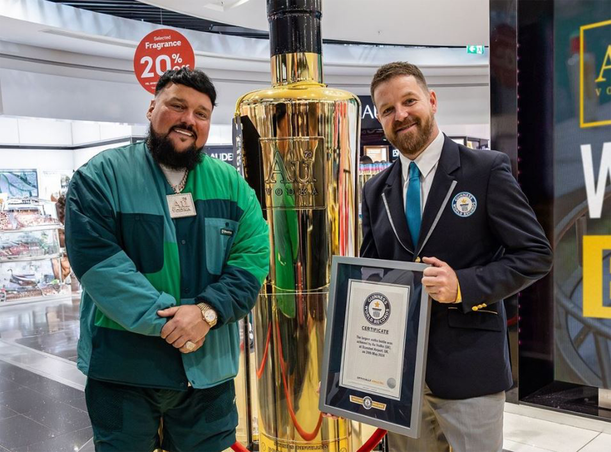 Influencer Charlie Sloth Unveils World’s Largest Vodka Bottle, a Nearly ...
